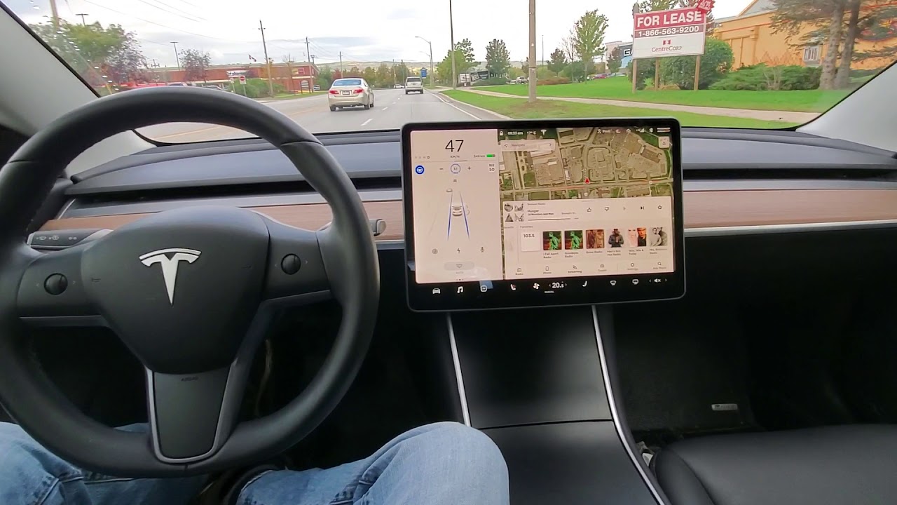 Tesla model 3 Auto steer on busy city street - YouTube