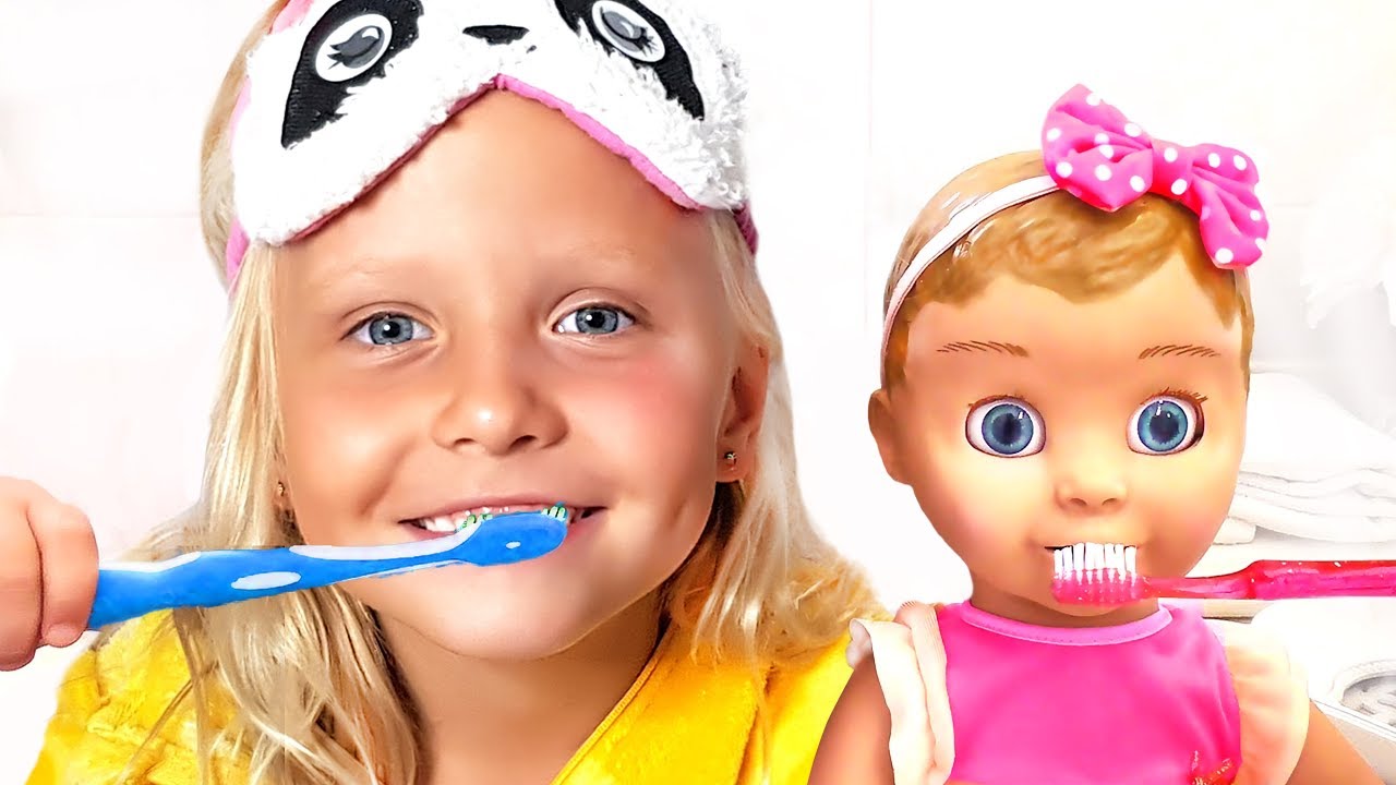 Alice pretend plays mummy for baby doll - YouTube