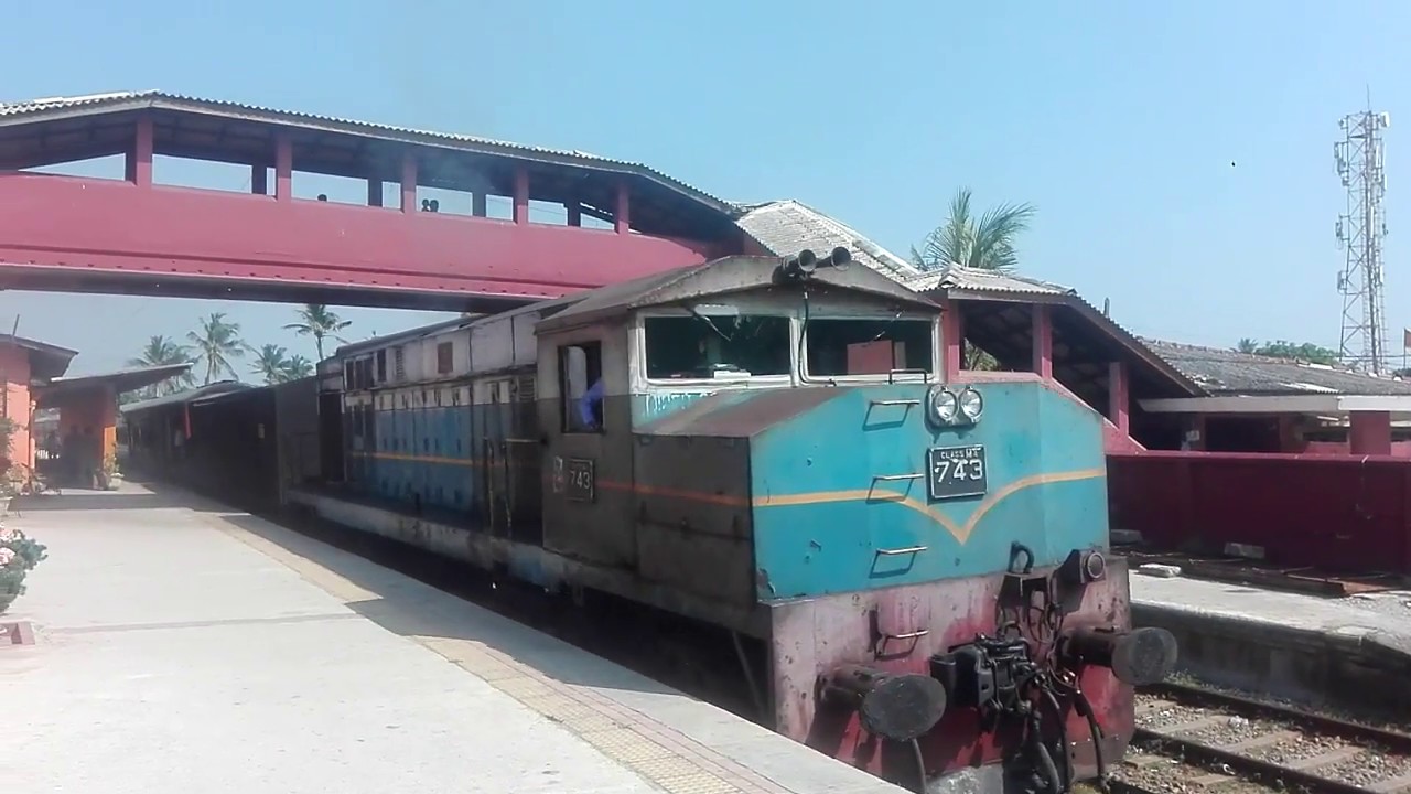 class M4 locomotive hauling express train in coastal line in Sri Lanka ...