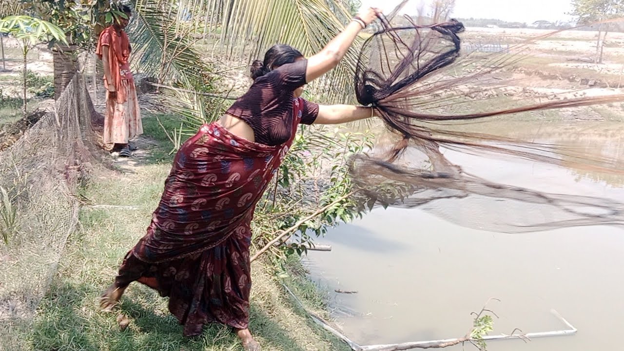 Beautiful girl catching fish with Cast net in village pond. - YouTube