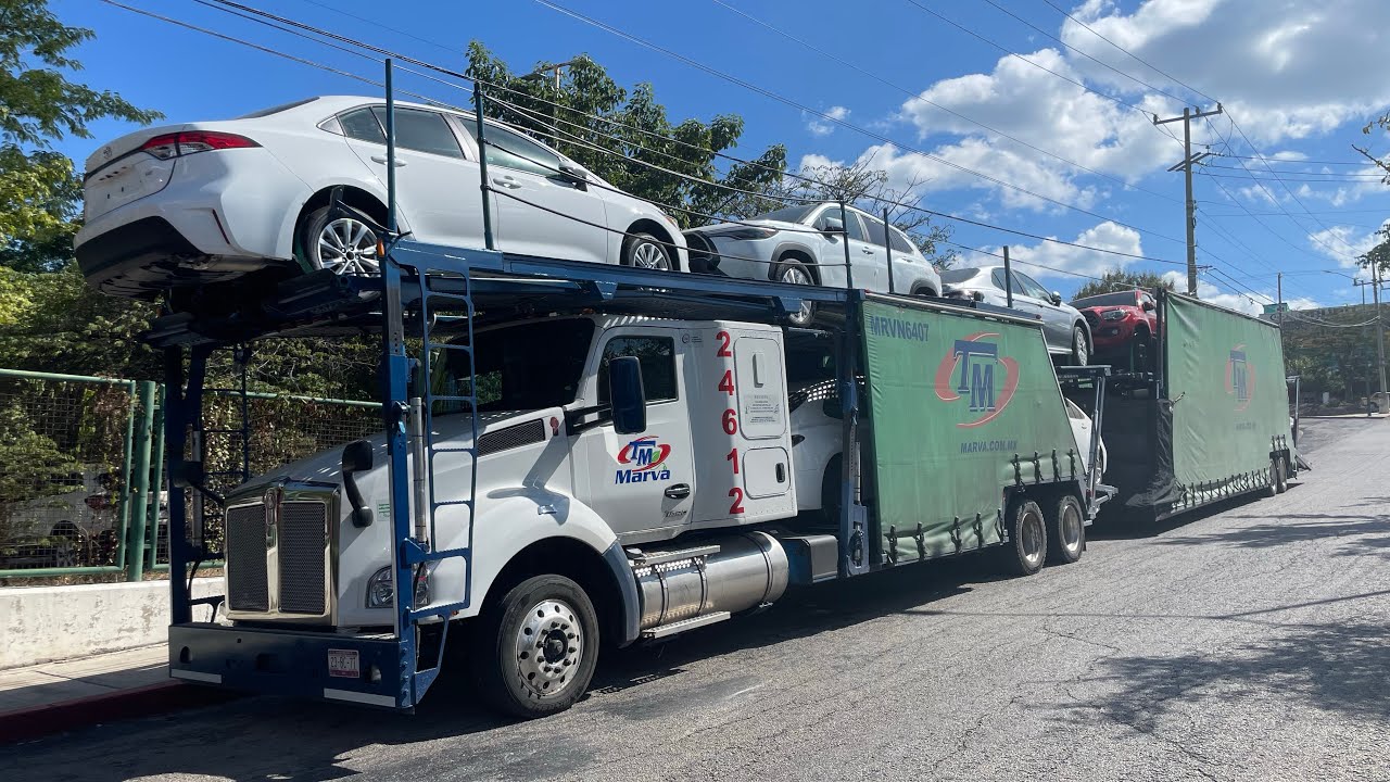 Car Carrier TM off loading Toyota - YouTube
