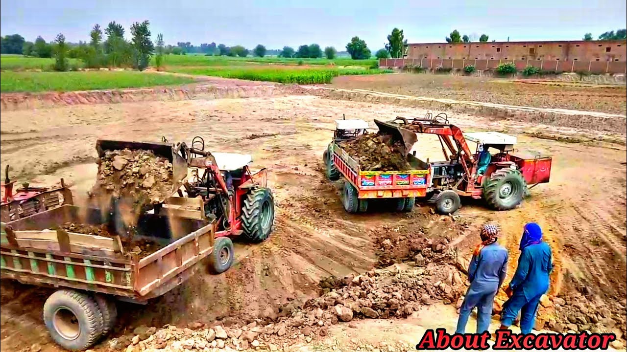 Loader 385 tractor loading the tralley - YouTube