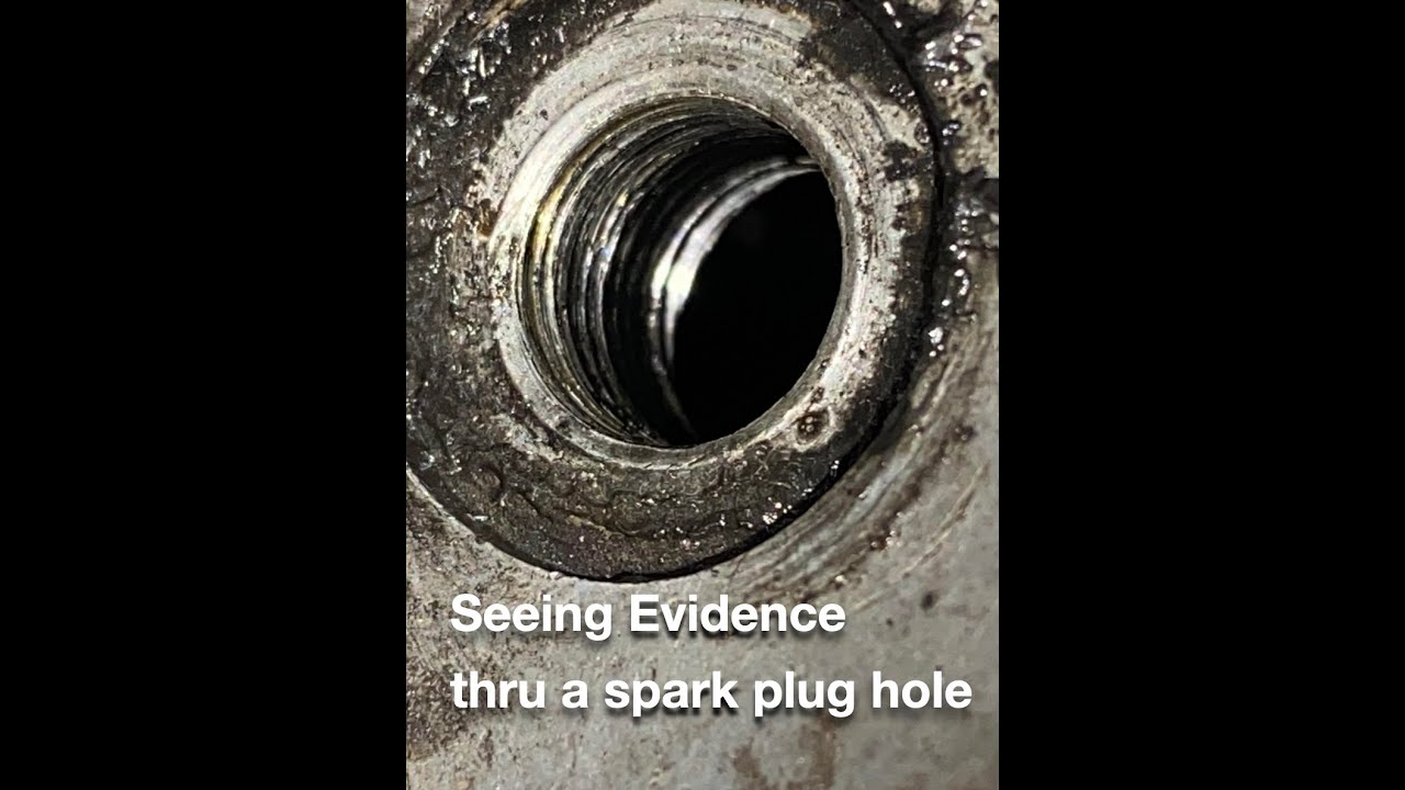 Seeing Evidence thru a spark plug hole #autorepair #borescope #kaiweets ...