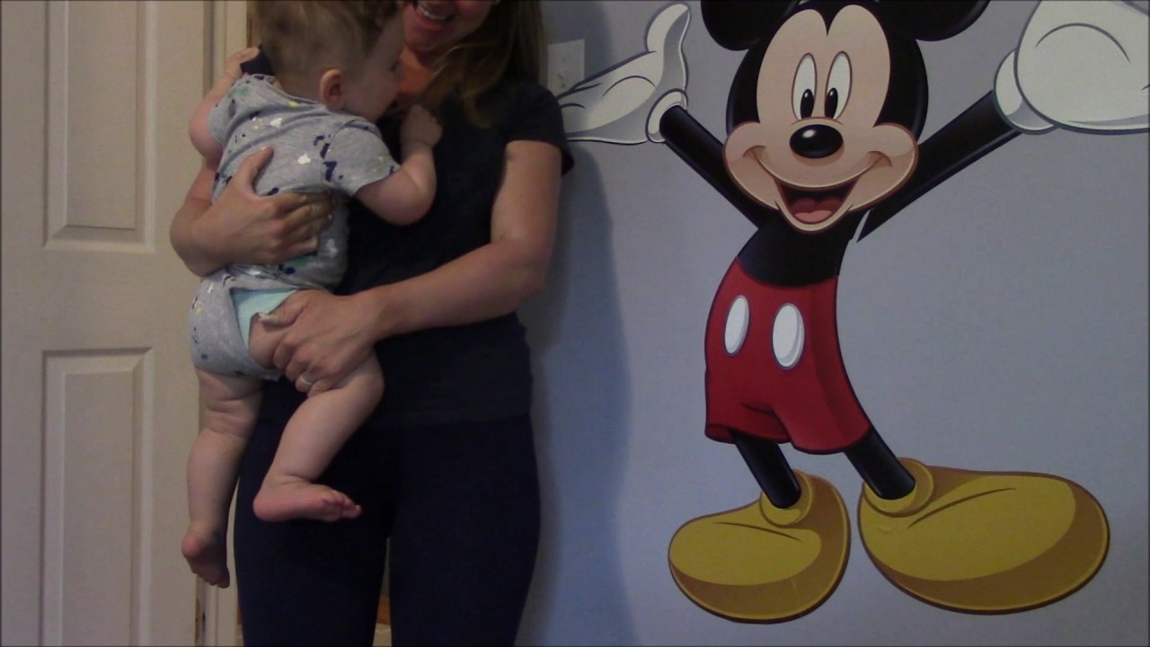 Baby is excited about Mickey wall decal - YouTube