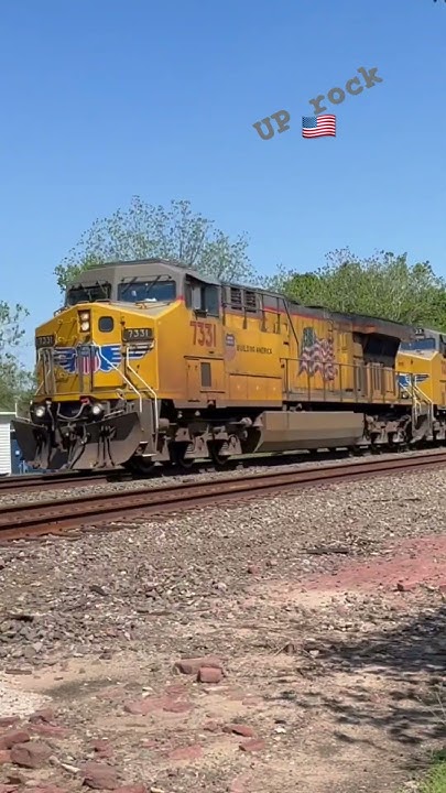 UP rock train meets BNSF manifest - YouTube