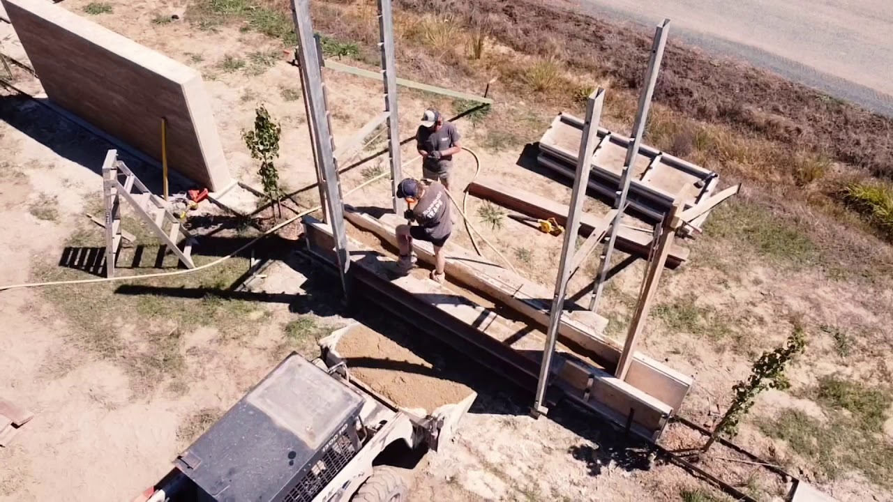 Rammed Earth Fence - YouTube