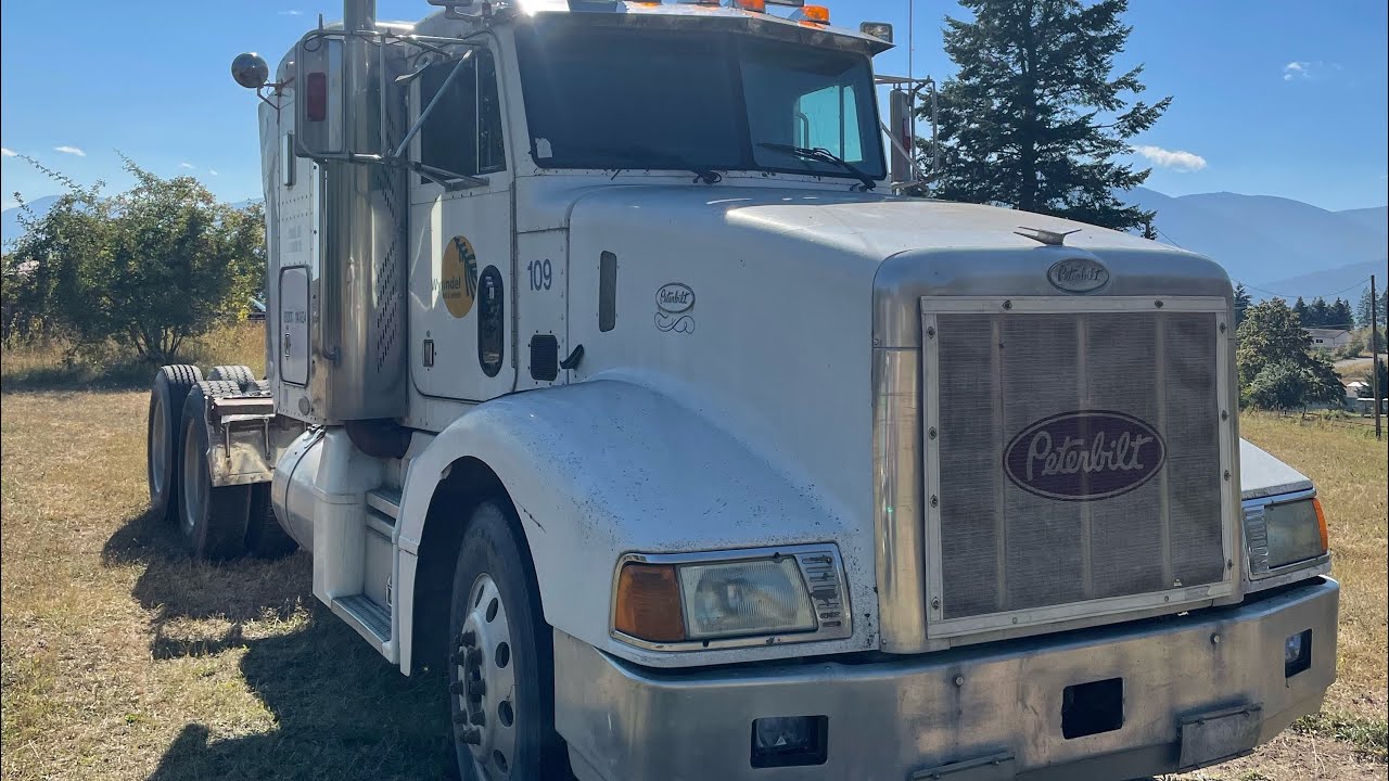 97 Peterbilt 377 N14 Cummins 18spd start up and walk around. - YouTube