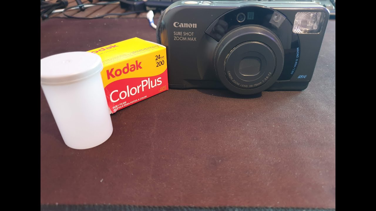 HOW TO: load a 35mm film into a Canon Sure Shot Zoom Max camera - YouTube
