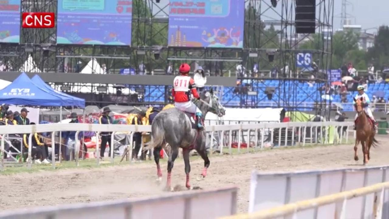 Traditional horse race held at 'Third Month Fair' in Yunnan - YouTube