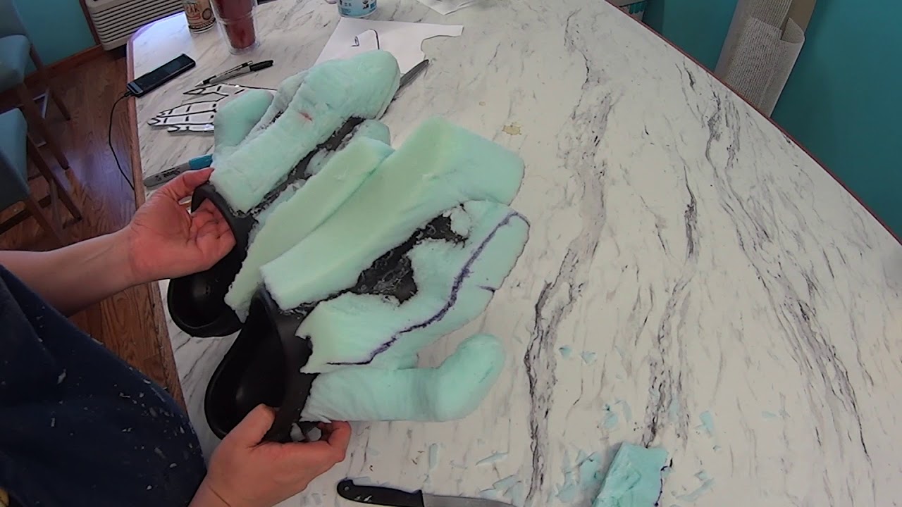 Carving a pair of Sergal fursuit feet - YouTube