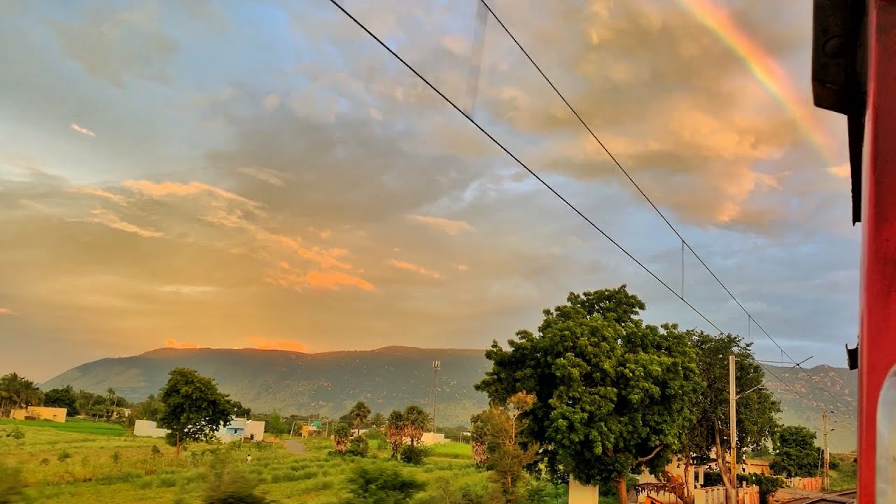 Spotting double Rainbow from train || crossing double decker express ...