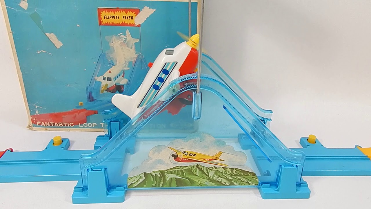 FLIPPITY FLYER 1960'S JAPAN TOMY TOY Airplane - YouTube