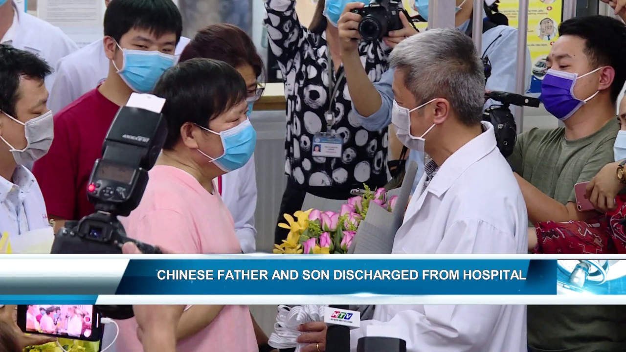 Chinese father and son discharged from hospital - YouTube