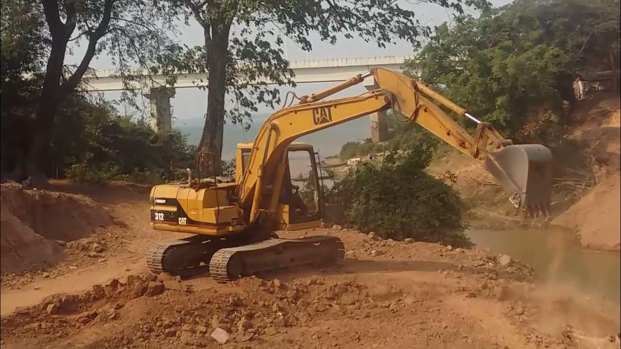 Excavator digging to building bridge || countryside of Cambodia - YouTube