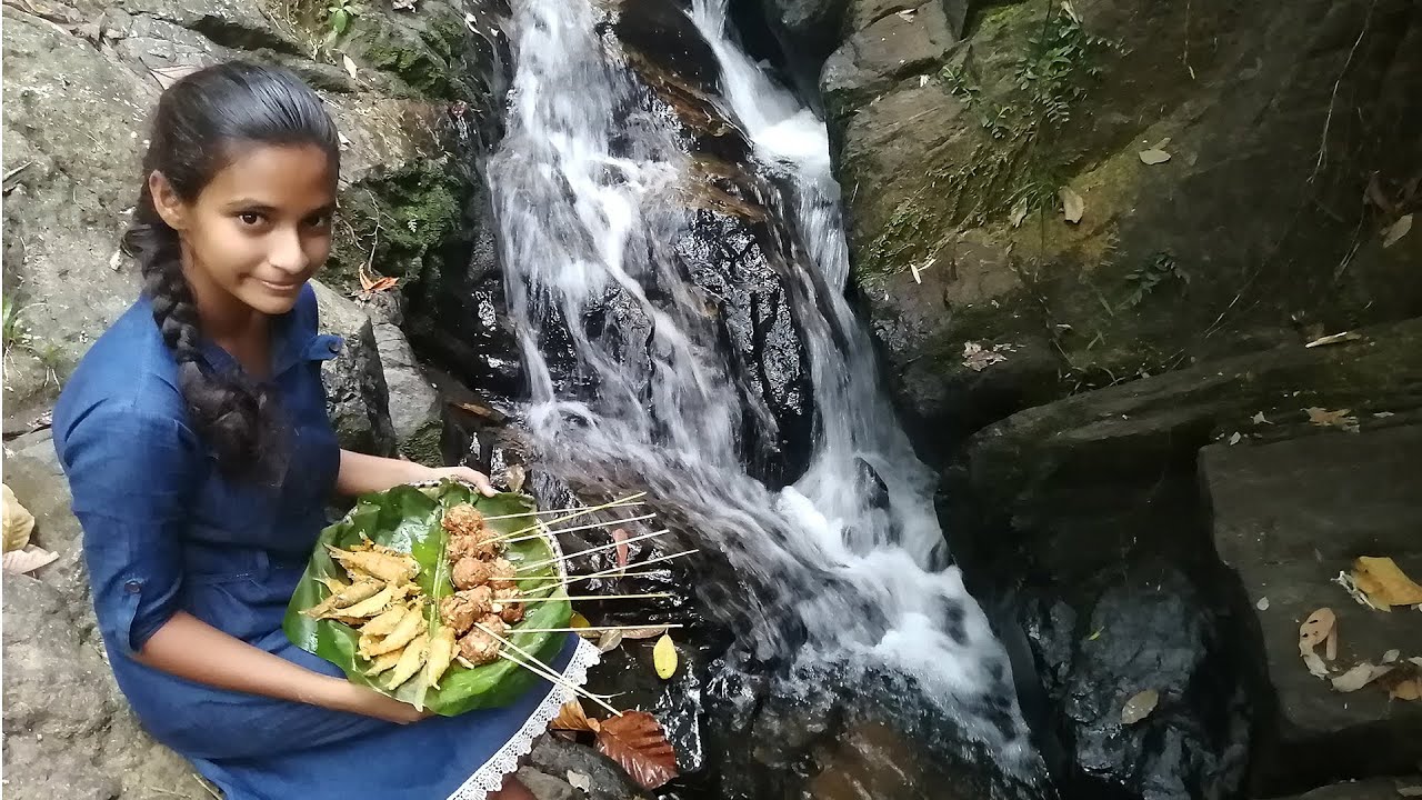 A day in the life of outdoor cooking near the waterfall. A delicious ...