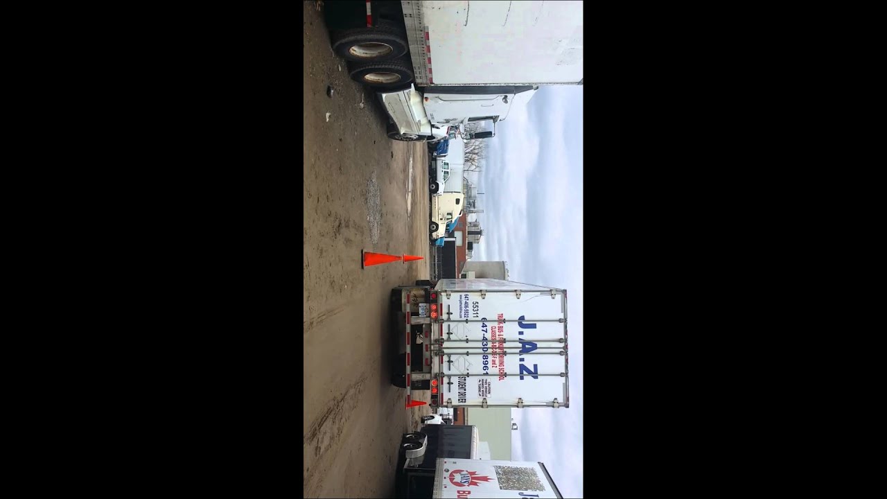 Tractor trailer backing up at J.A.Z - YouTube