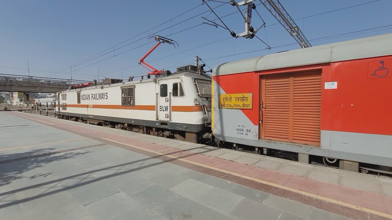 12239 Mumbai Central - Hisar DURONTO EXPRESS behind BRC WAP-7 departing ...