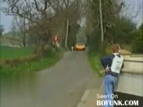 Photographer almost run over by Racecar - YouTube