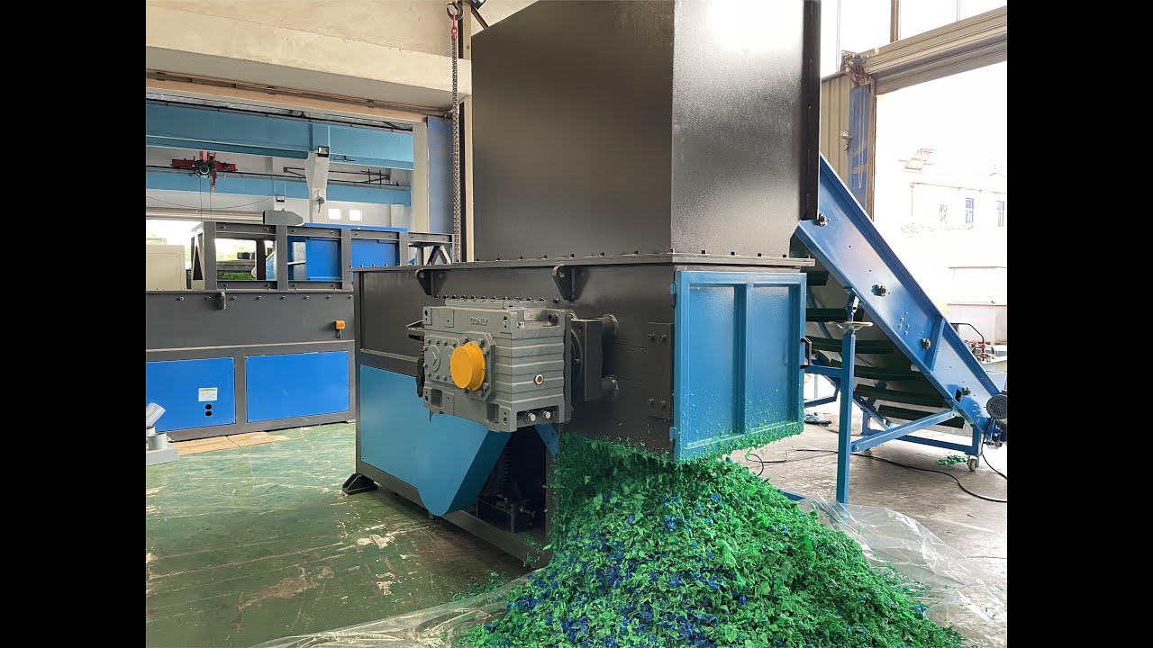 Plastic film single shaft shredder waste lumps shredding machine - YouTube