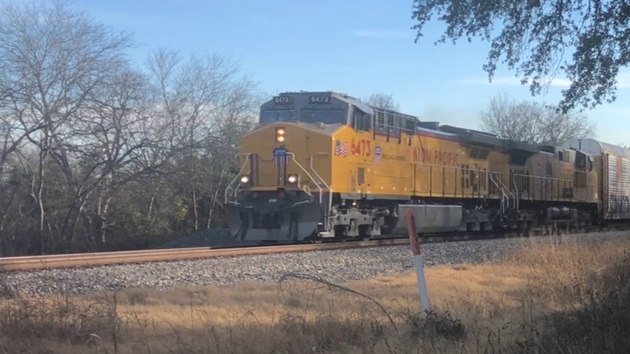 New Union Pacific paint scheme leads a Northbound train passing fm 1626 ...