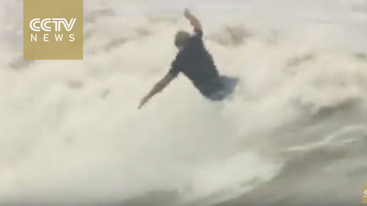 Watch: Surfing China's Qiantang River Tidal Bore in Hangzhou - YouTube