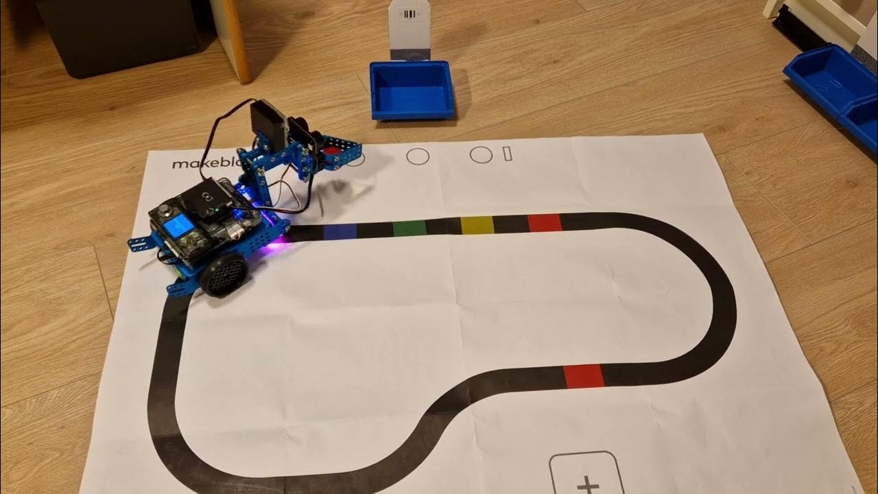 mbot2 robot with the robotic arm and the smart camera collecting red ...