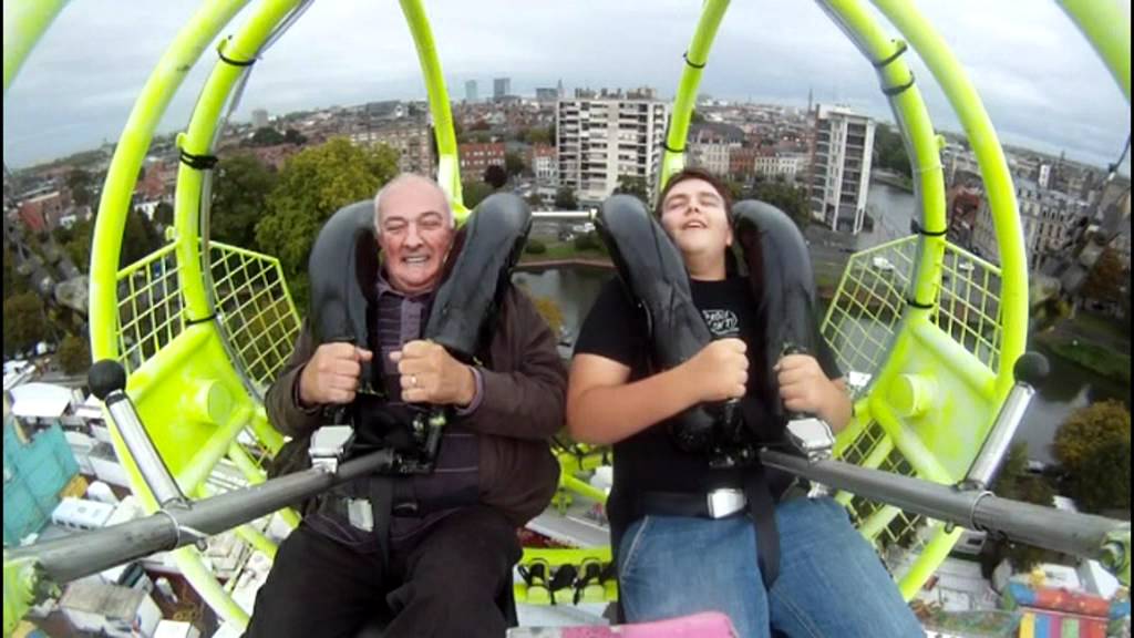 My grandfather and my brother on the slingshot ride - YouTube