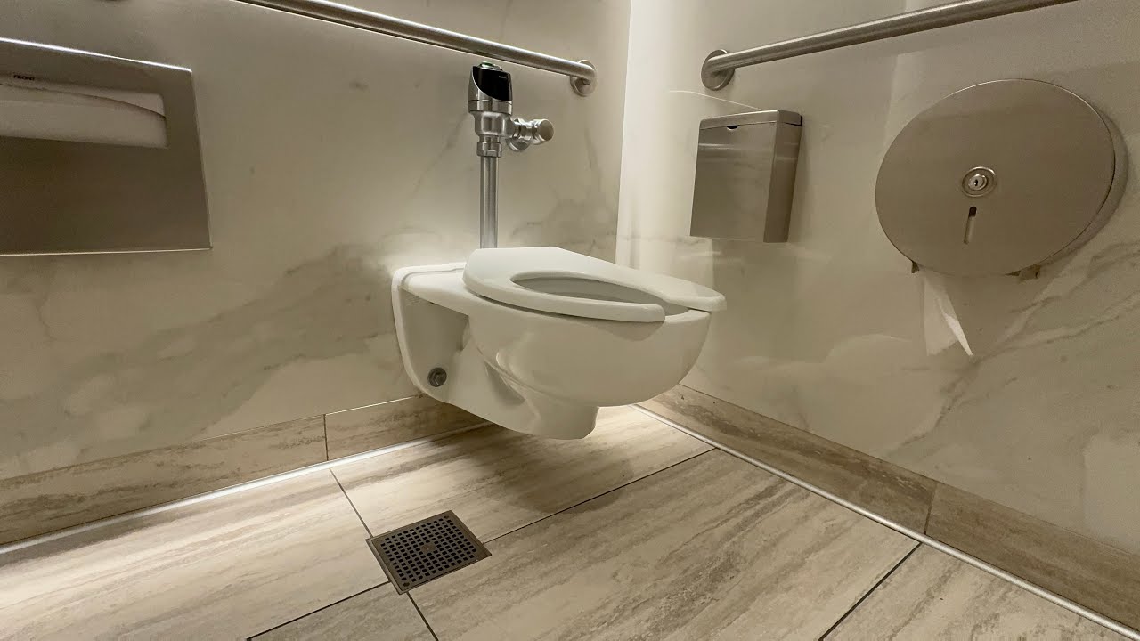 Kohler Kingston Ultra Toilet Flush in Women’s Restroom | Conrad Hotel ...