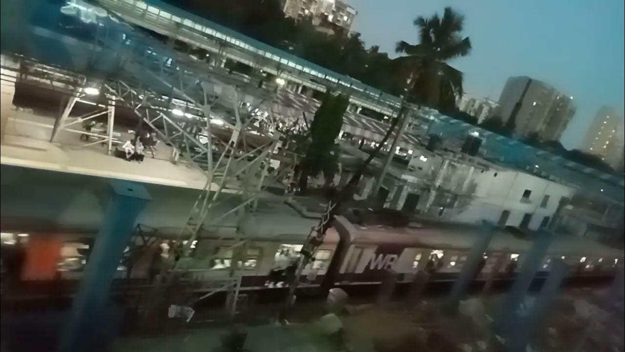 Andheri mumbai local station view shortcut se ticket counter Frist floor running train public ...