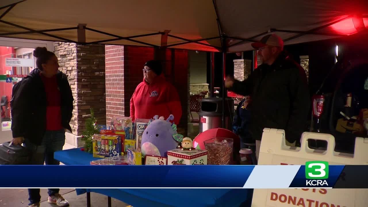 Davis police collect toys outside Target to give to kids - YouTube