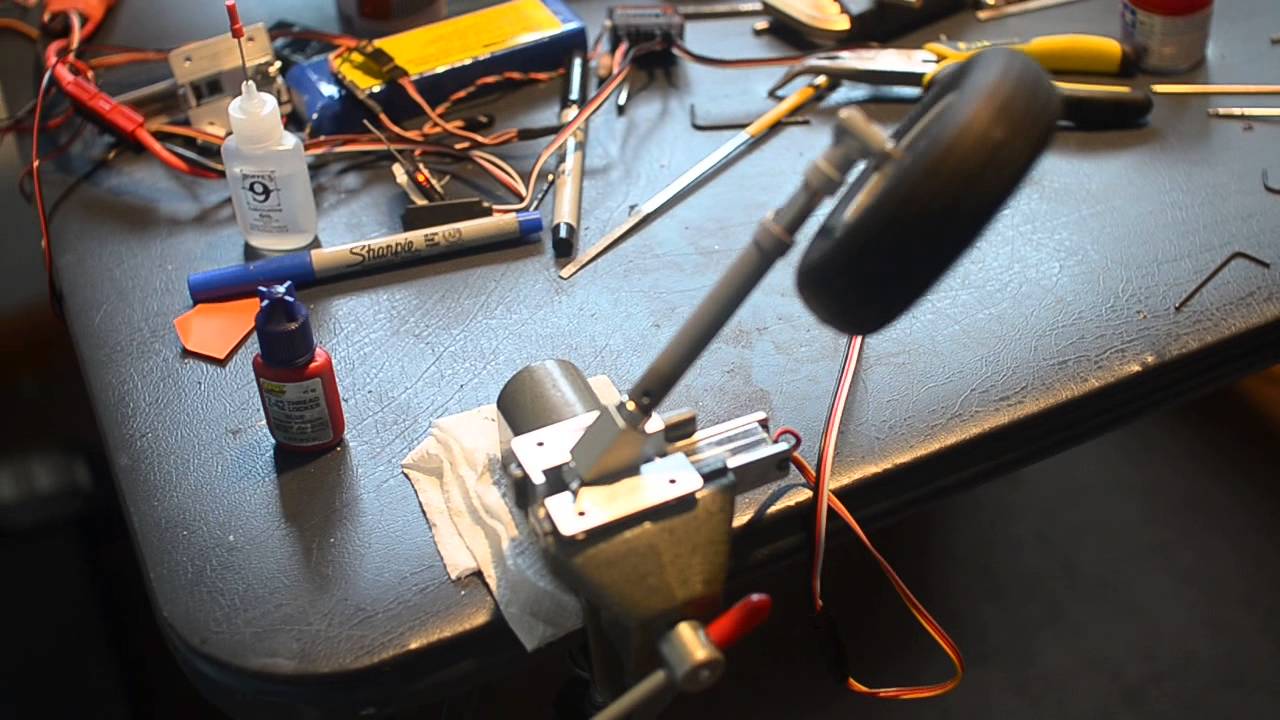 Eflite rotational retract with Robart 650 Strut - YouTube