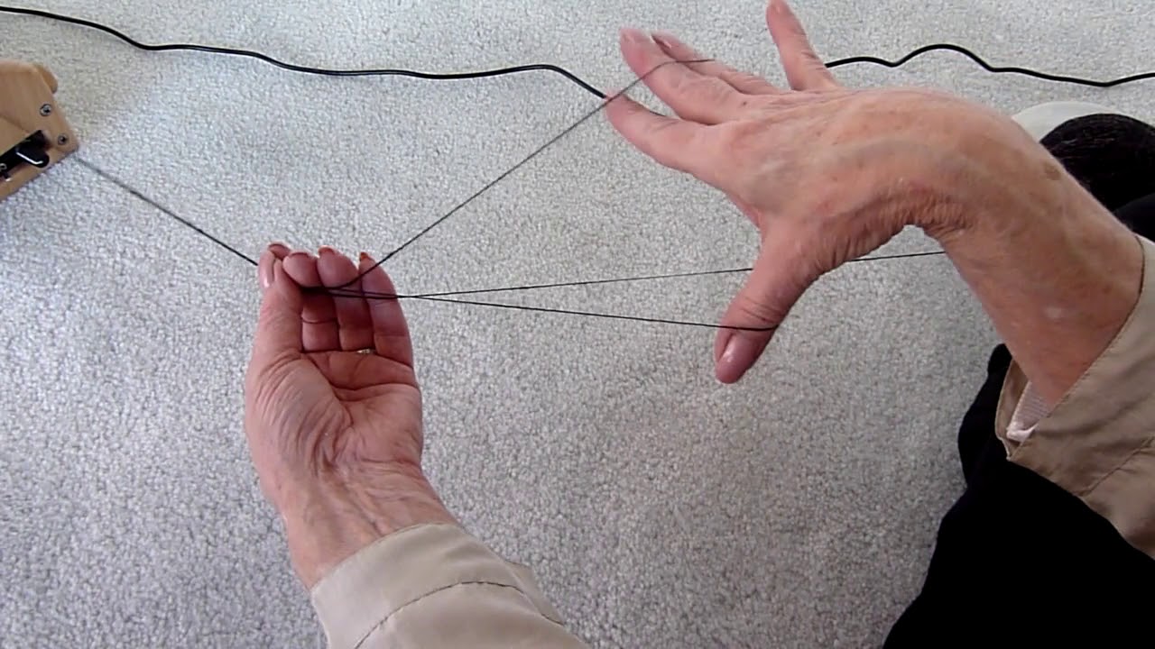 Chain Plying on a Spinning Wheel - YouTube
