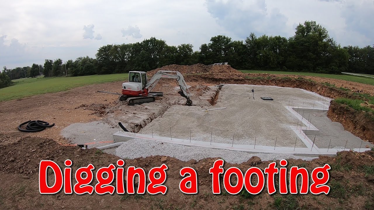 Digging A Frost Footing With The Takeuchi TB260 - YouTube