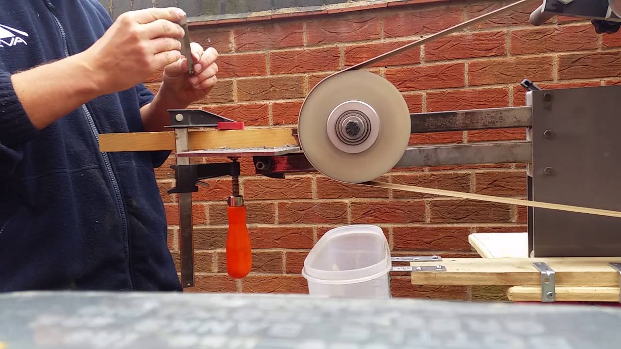 Initial grind of the very first straight razor - YouTube