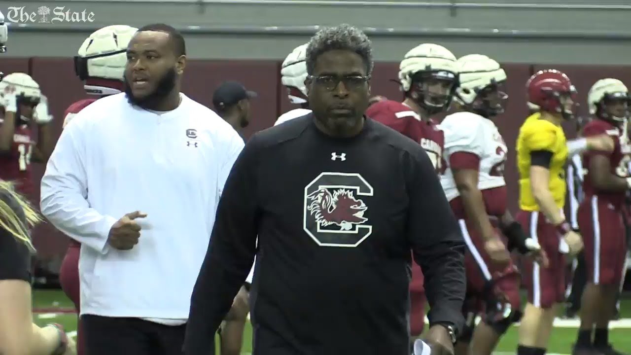 Defensive line coach Tracy Rocker runs drills with the USC Gamecocks ...