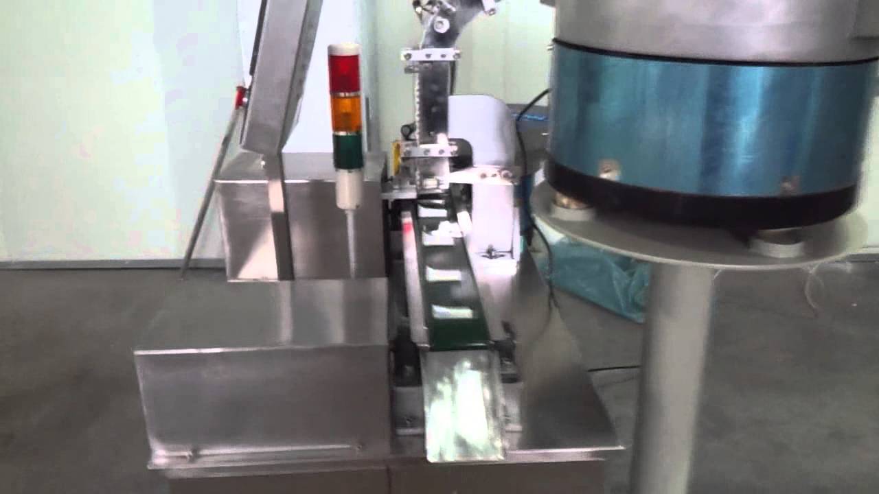 Assembly Machine of Roller Clamp - YouTube