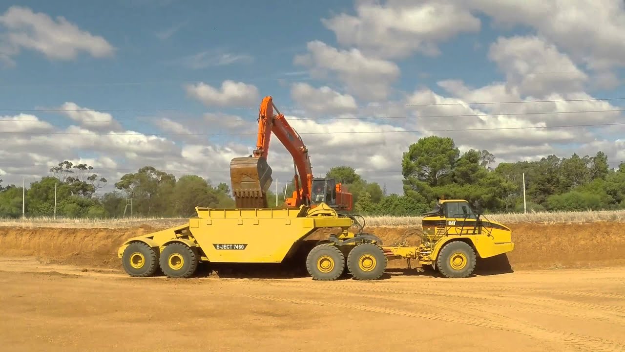 CAT 740 with 90 tonne E-Ject - Load and Unload - YouTube