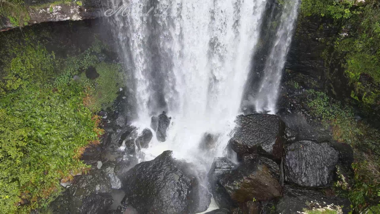 Slow tilt down into Zillie Falls, Atherton Tablelands, QLD - YouTube