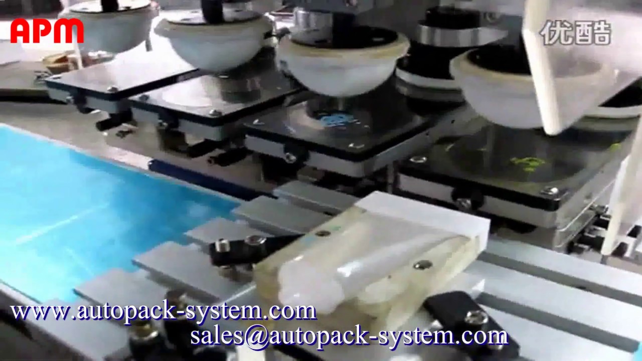 Four color pad printing machine - YouTube