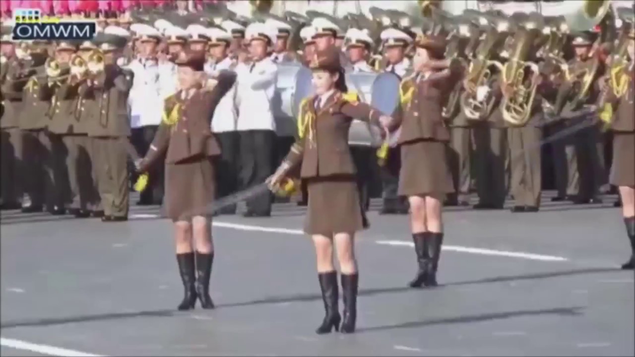 Nth Korean Army goose stepping to Benny Hill. (because its easier to ...