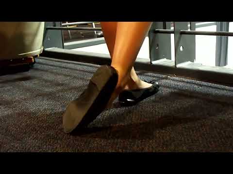 Candid standing teacher shoeplay. 57 min video available.