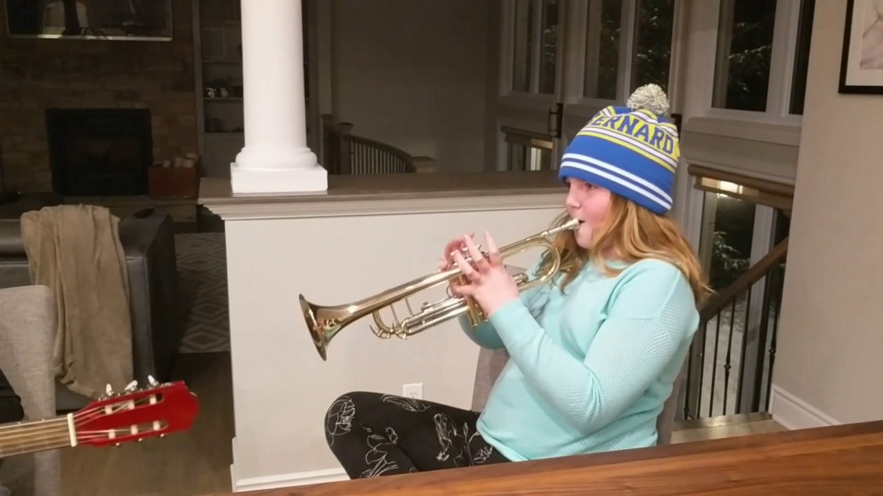 Sarah plays the Trumpet for the first time. - YouTube