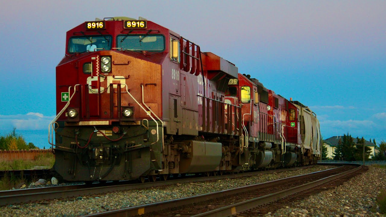 RARE!! SD40-2 and GP38-2!! CP 8916, CP 5936, and CP 4432 lead CP C35 west at Cochrane, Alberta ...