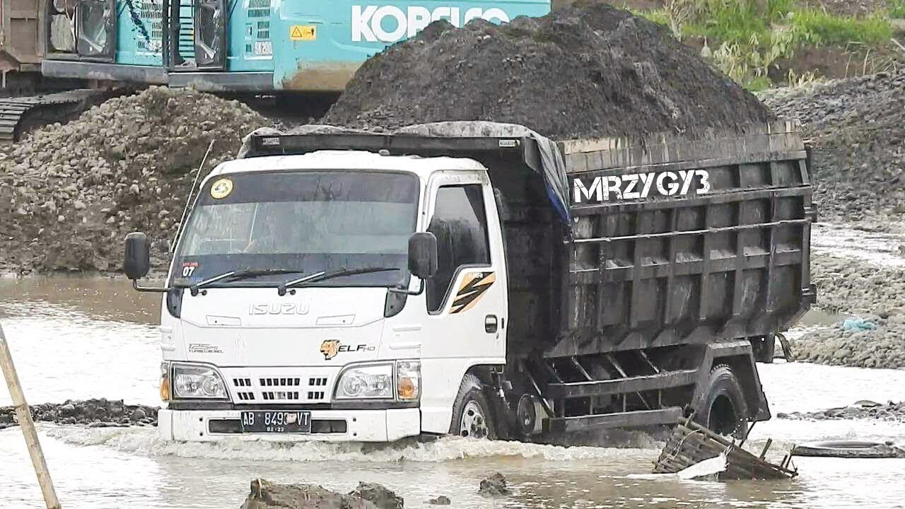 Full Overloaded Dump Truck Moving Sand By Kobelco SK200-10 Excavator ...
