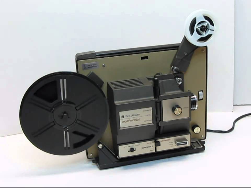 Bell & Howell Model 497A projector - YouTube