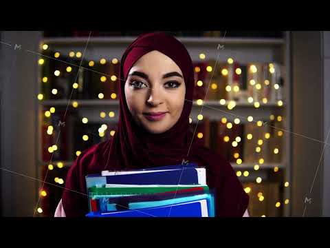 Determined professional portrait. Focused woman in hijab holding documents with authoritative stance