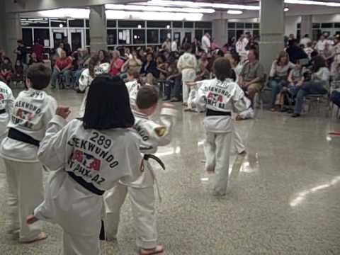 Jacob Organek 7 year old black belt at mid-term demonstrations. - YouTube