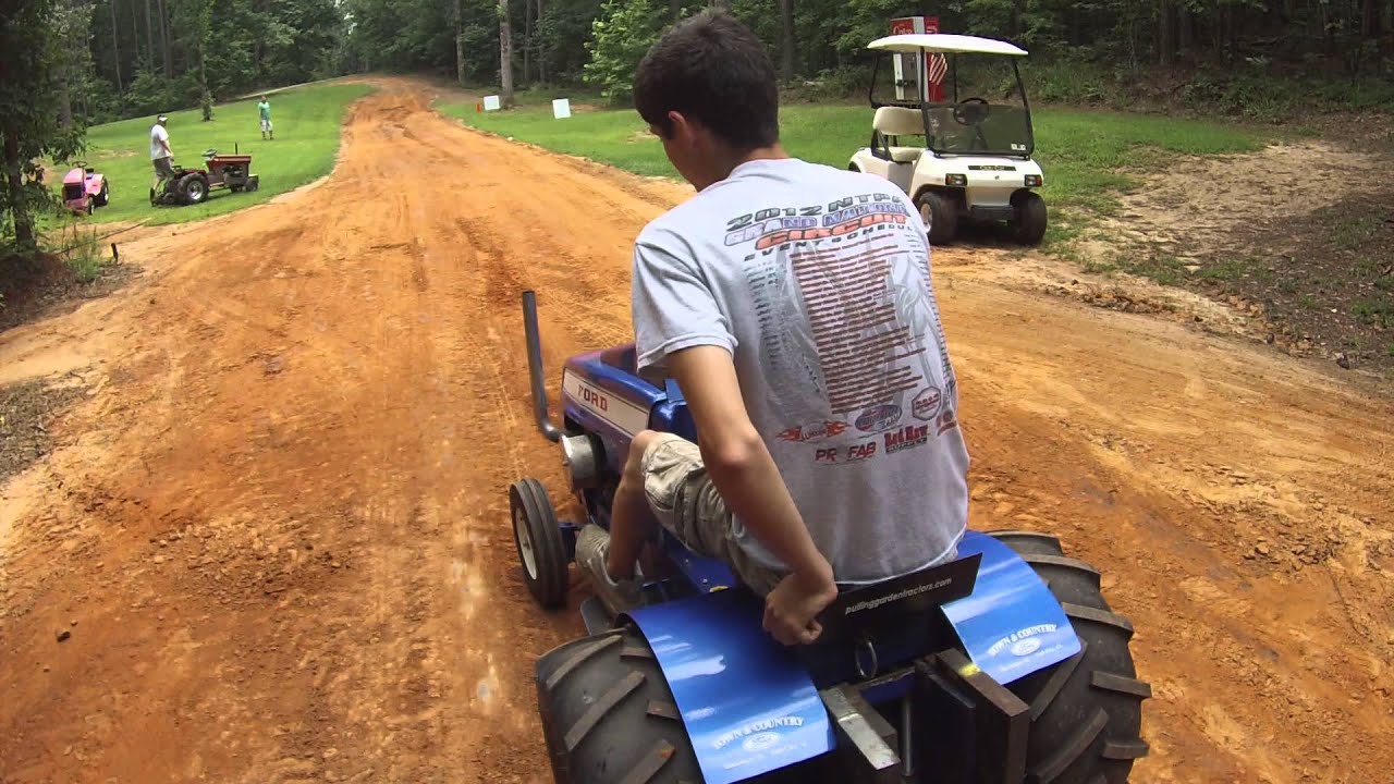 Alabama garden tractor pull 12hp light stock modified - YouTube