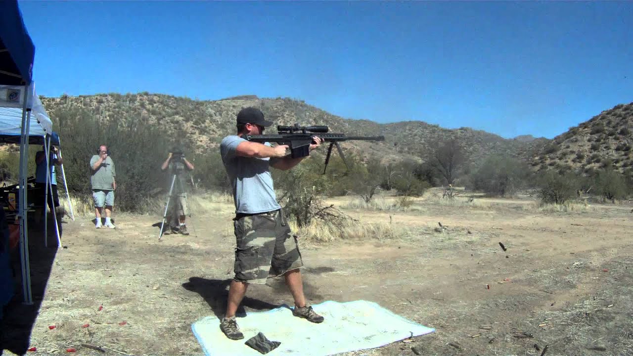 50 cal BMG standing 10 rounds rapid fire - YouTube