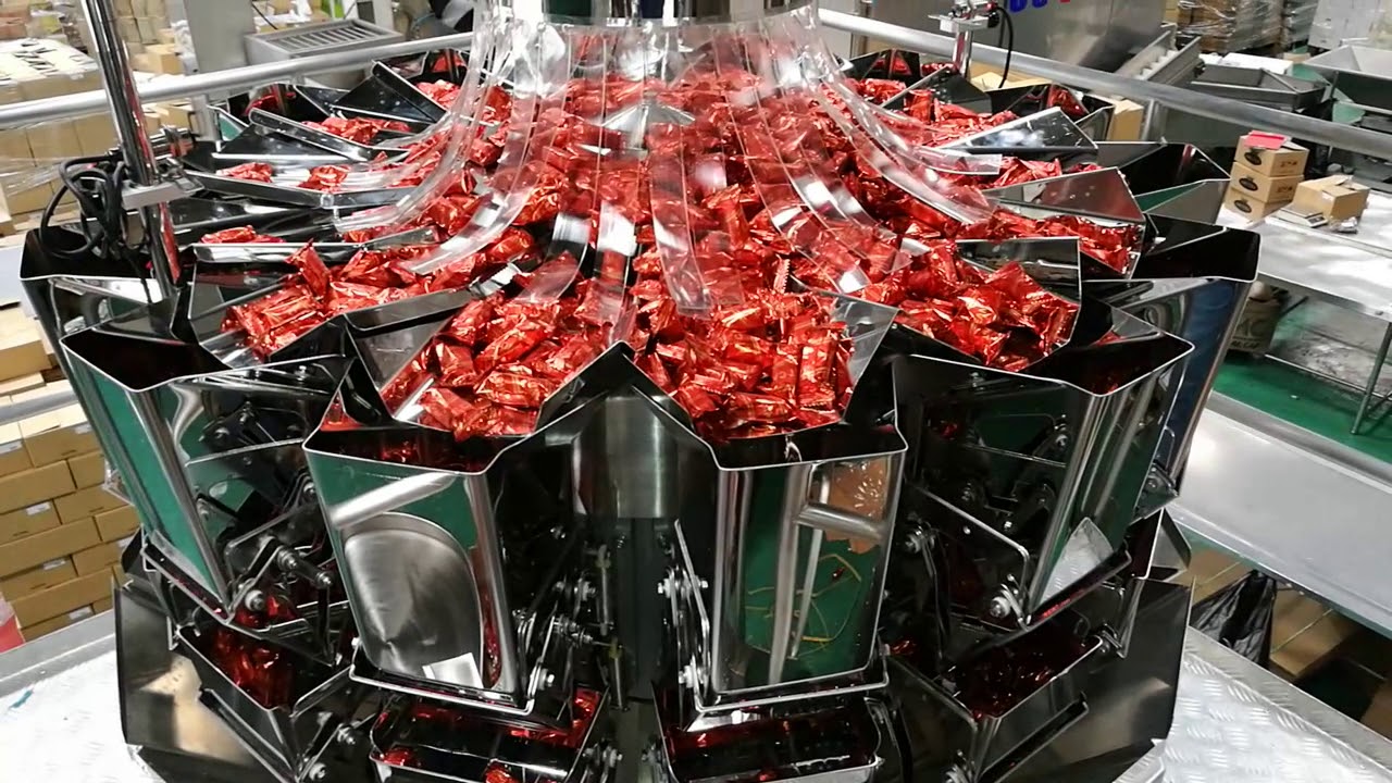 14 Head Multihead Weigher+520VFFS packing line for snacks - YouTube